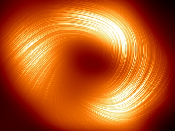 Astronomers capture magnetic fields twirling around black hole ...